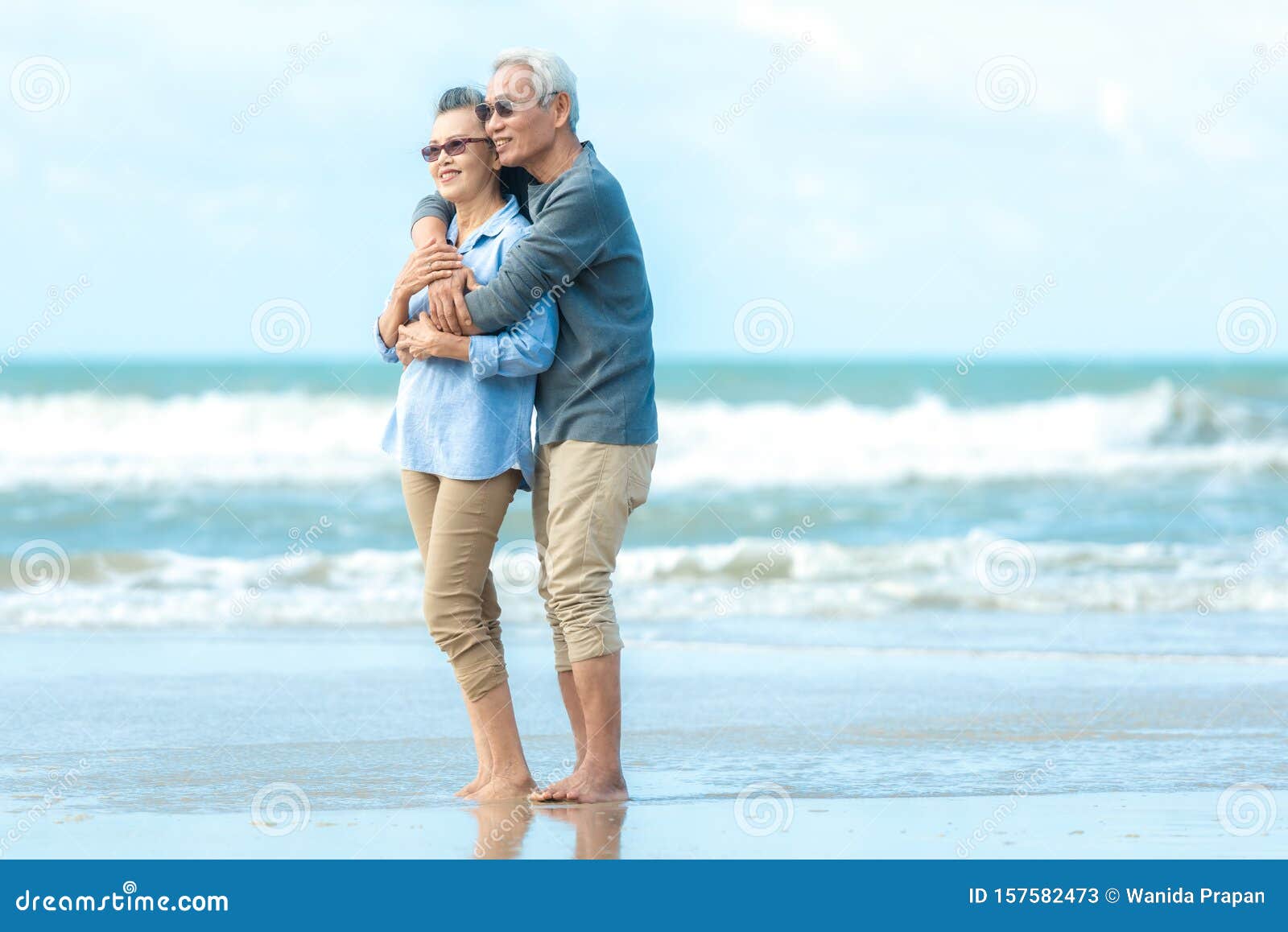 Asian Lifestyle Senior Couple Hug On The Beach Happy In Love Romantic